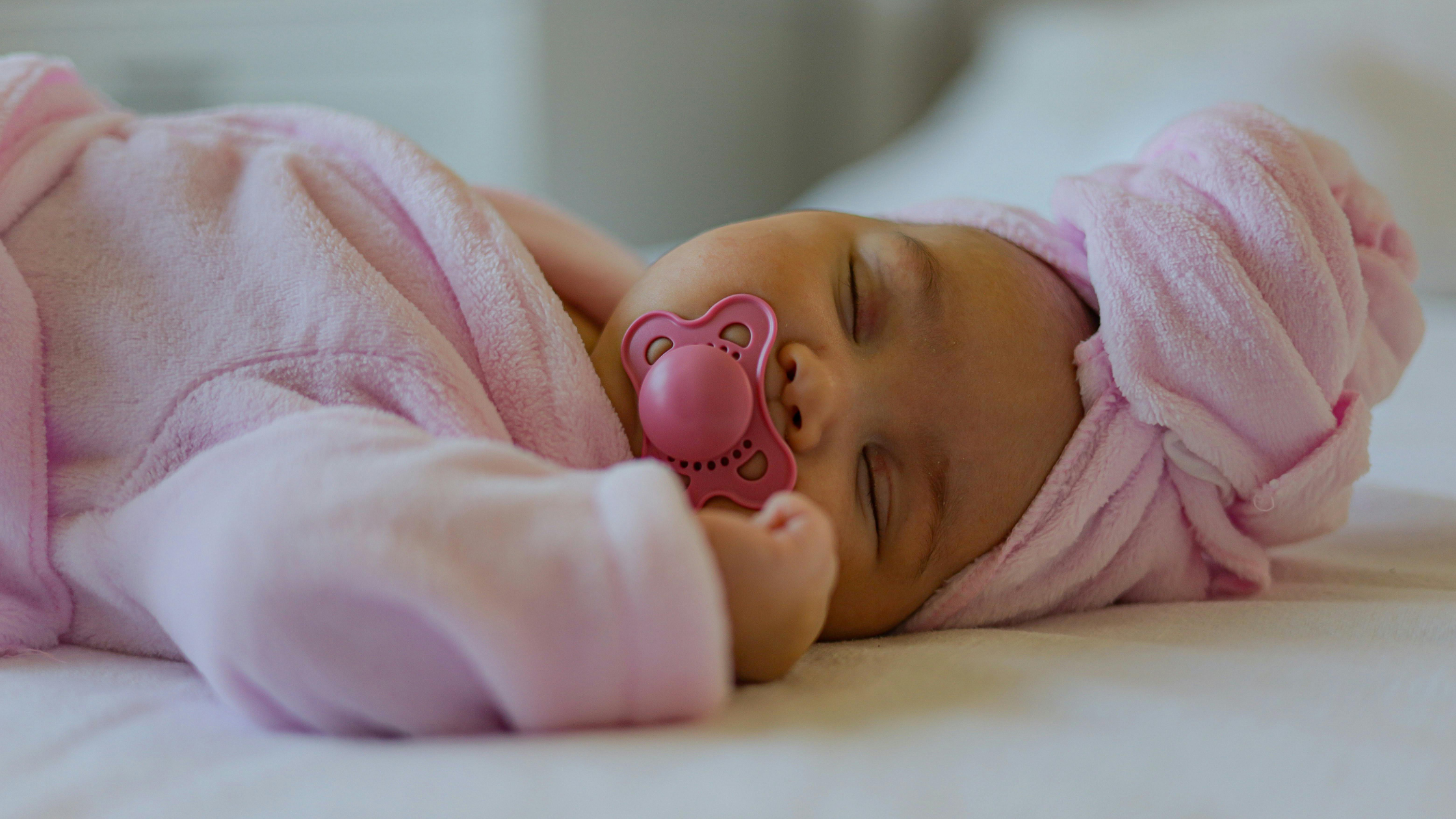 How Sleeping with a Pacifier Can Lower the Risk of SIDS